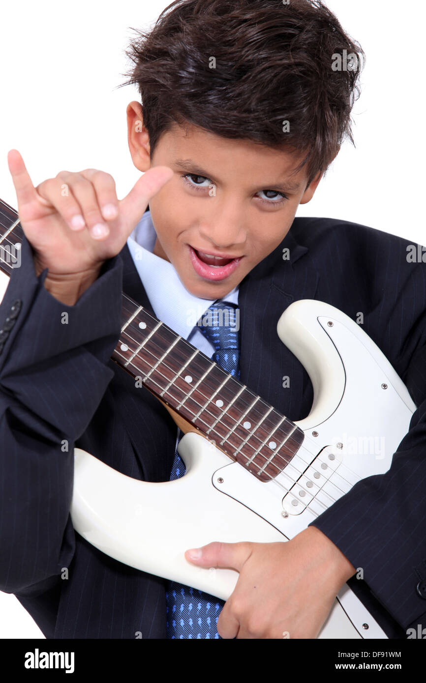 A little boy playing guitar Stock Photo - Alamy