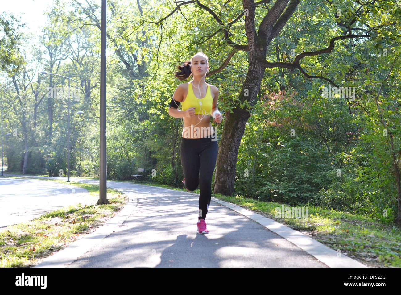 beautiful young woman running Stock Photo - Alamy