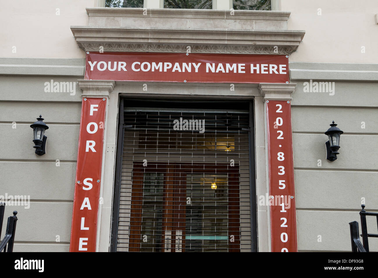 Commercial building for sale sign Stock Photo - Alamy