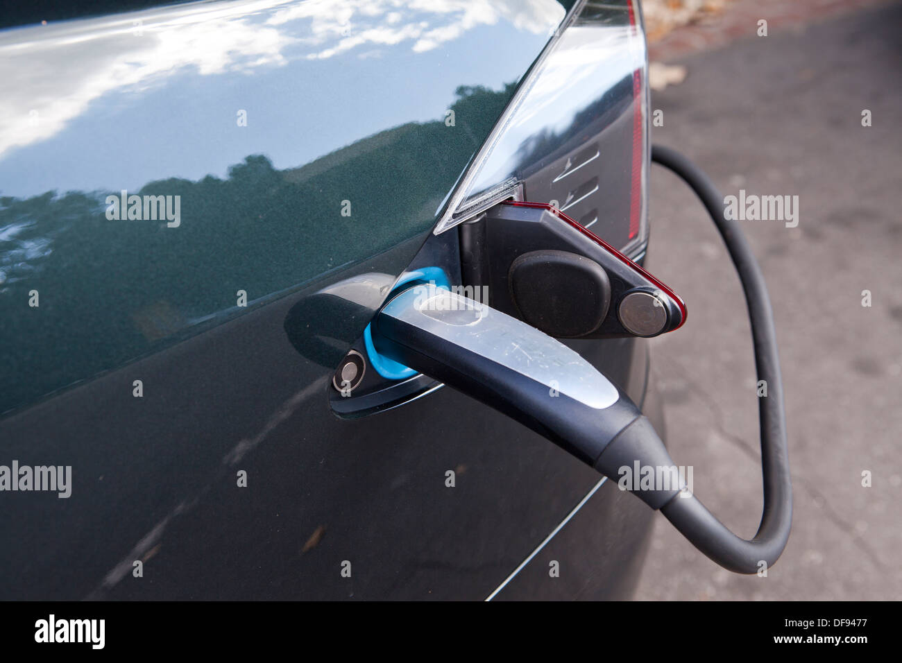 Tesla Model S electric car plugged in - USA Stock Photo - Alamy