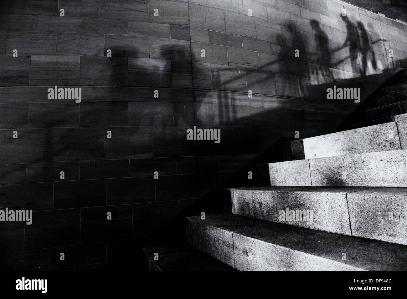 Shadows descending stairs hi-res stock photography and images - Alamy