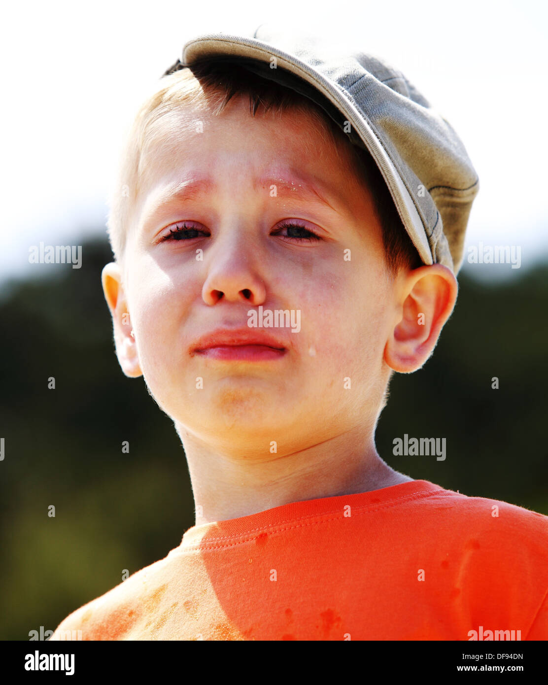 Sad child. Portrait of crying unhappy little boy outdoor Stock Photo ...