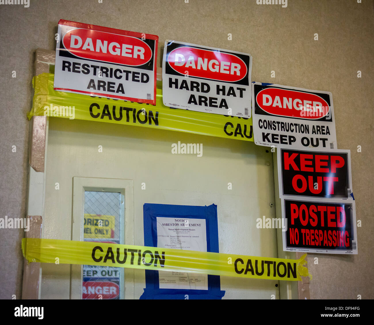 Safety reminders, no trespassing and danger signs bar entry during an ...