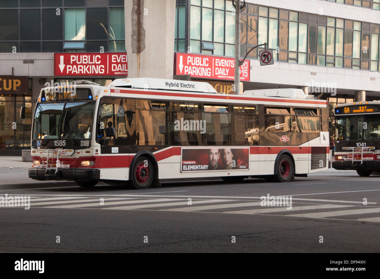 TTC hybrid electric bus in downtown Toronto Stock Photo - Alamy