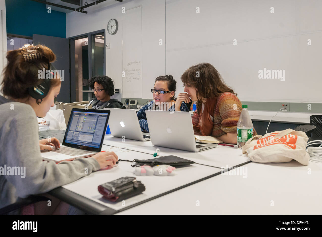 Participants collaborate on developing computer games at a game jam at ...
