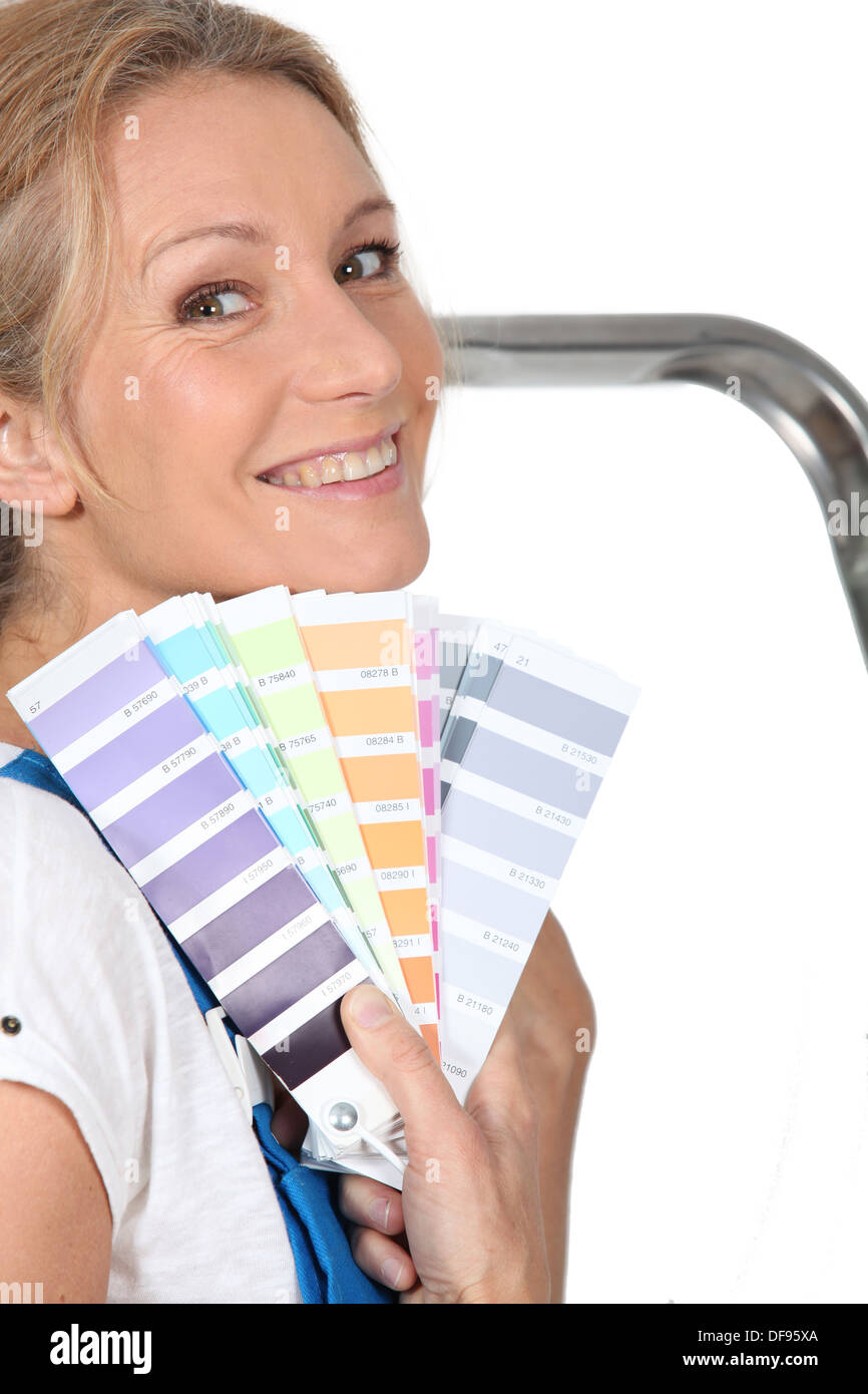 Woman choosing paint color Stock Photo - Alamy