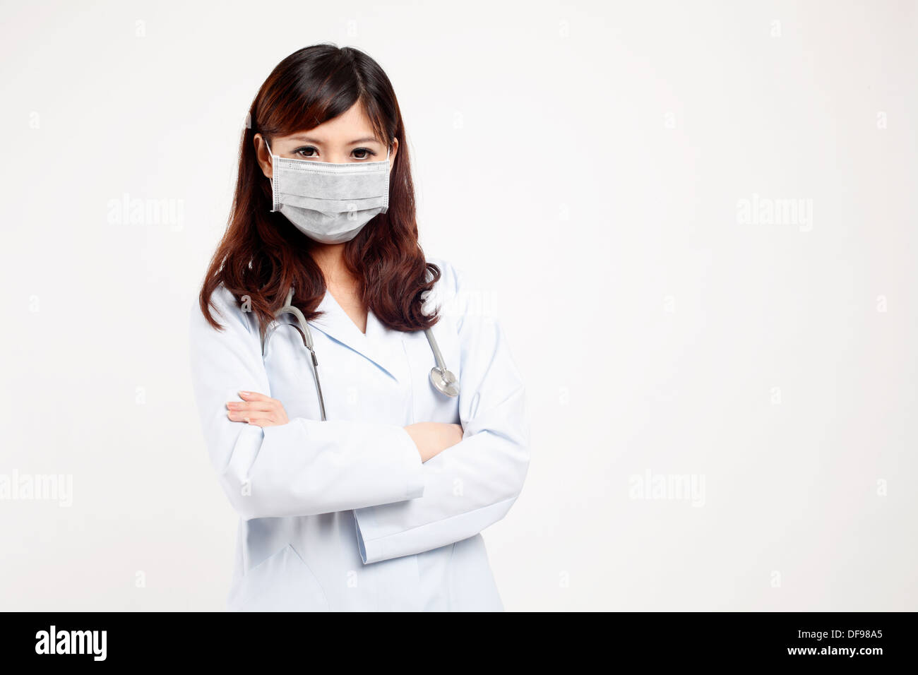 Female doctor wears mask Stock Photo - Alamy