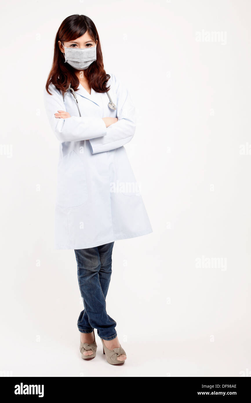 Female doctor wears mask Stock Photo - Alamy