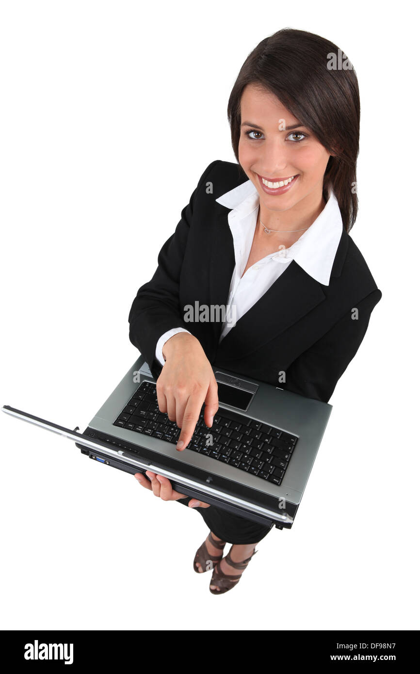 Brunette woman with computer Stock Photo - Alamy