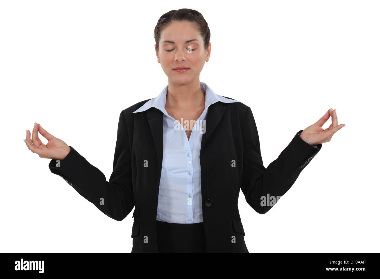 Executive woman staying Zen Stock Photo - Alamy