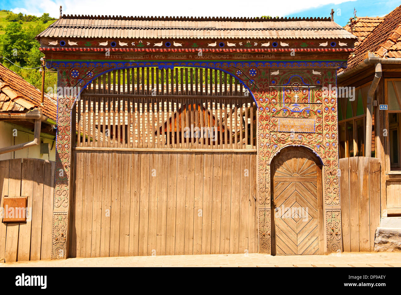 Traditional folk art wooden Szekely gates in a Szekely village near ...