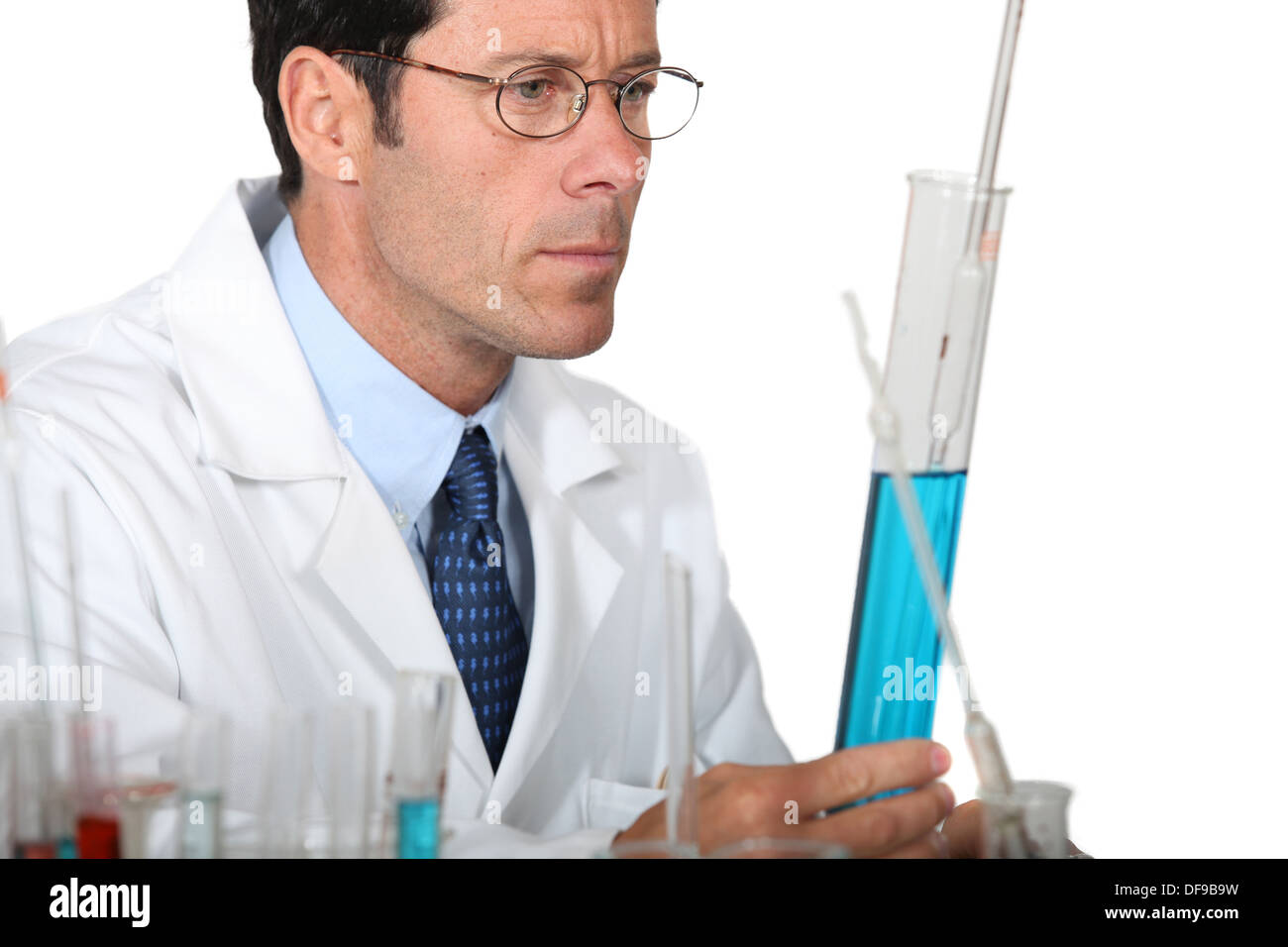 scientist looking at test tube Stock Photo - Alamy