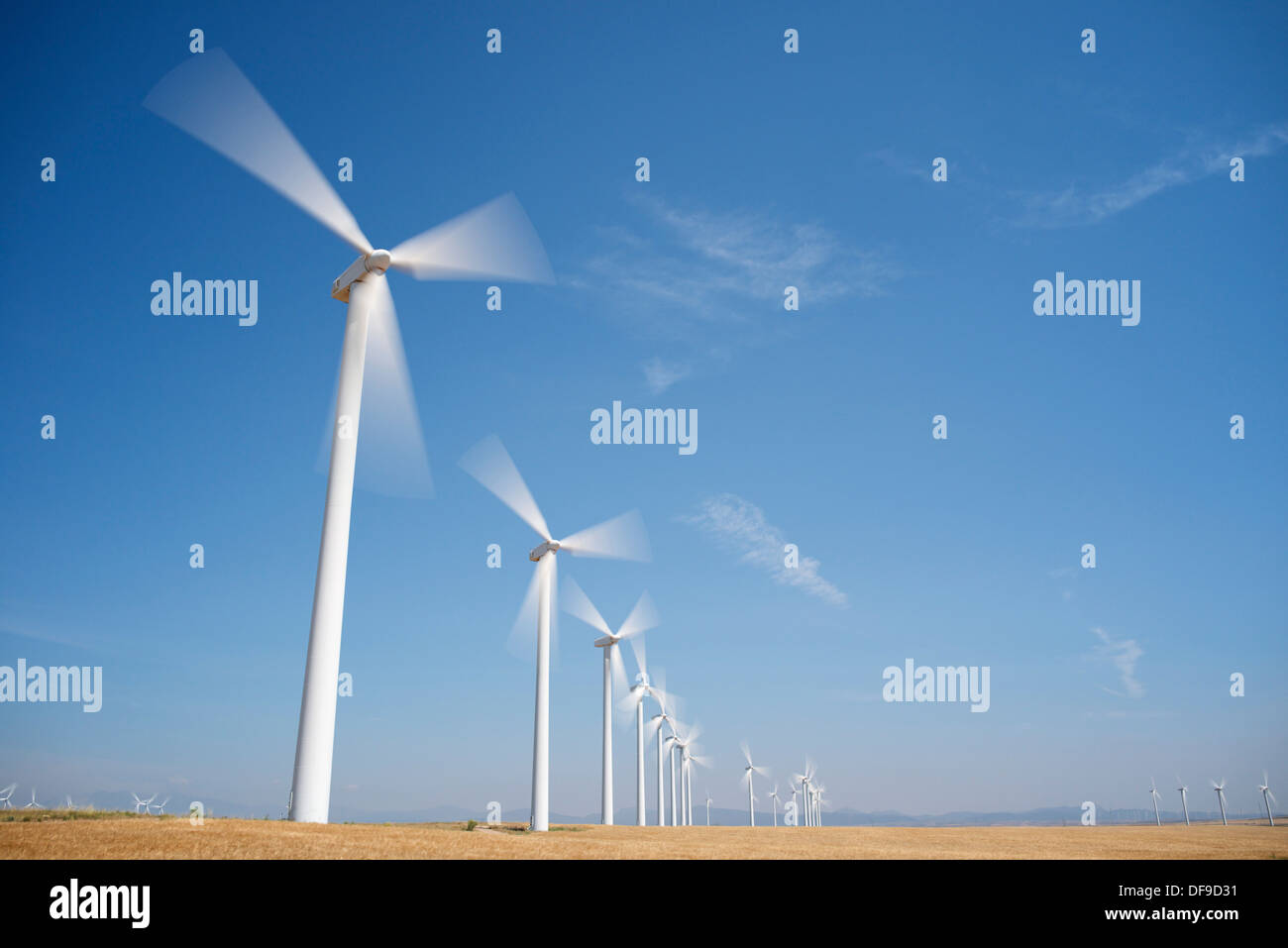 group of windmills for renewable electric energy production Stock Photo ...