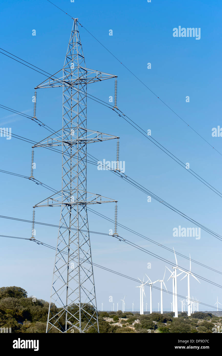 windmills for removable energy production and pylon Stock Photo - Alamy