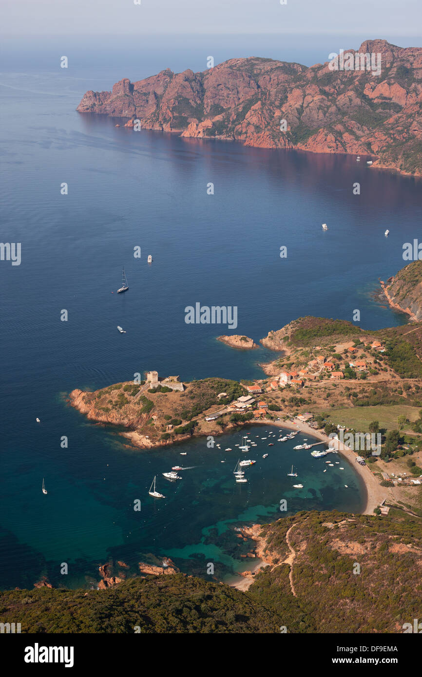 AERIAL VIEW. Car-free village of Girolata with its Genoese tower, and ...