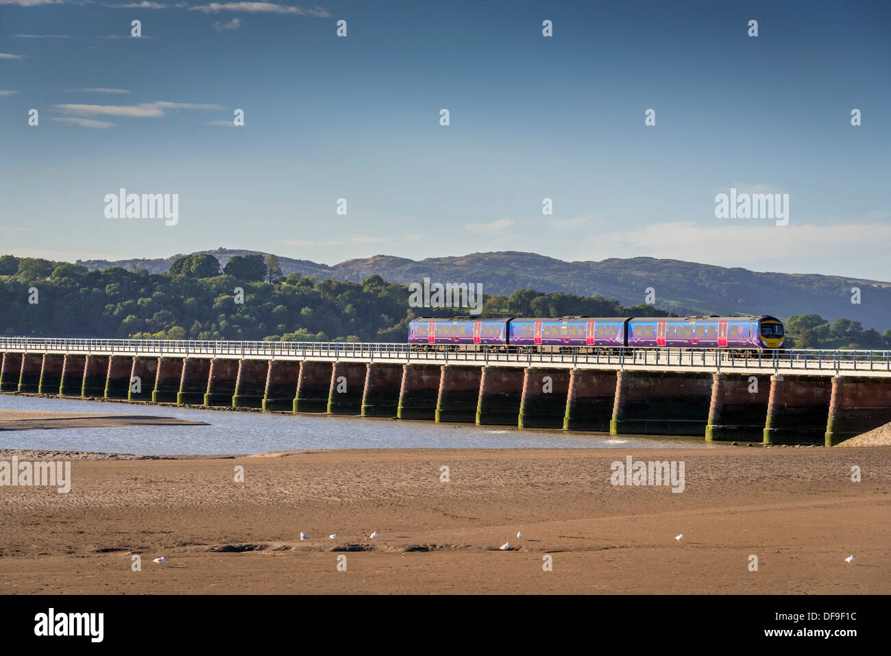 The railway viaduct at Arnside over the River Kent estuary in Cumbria ...