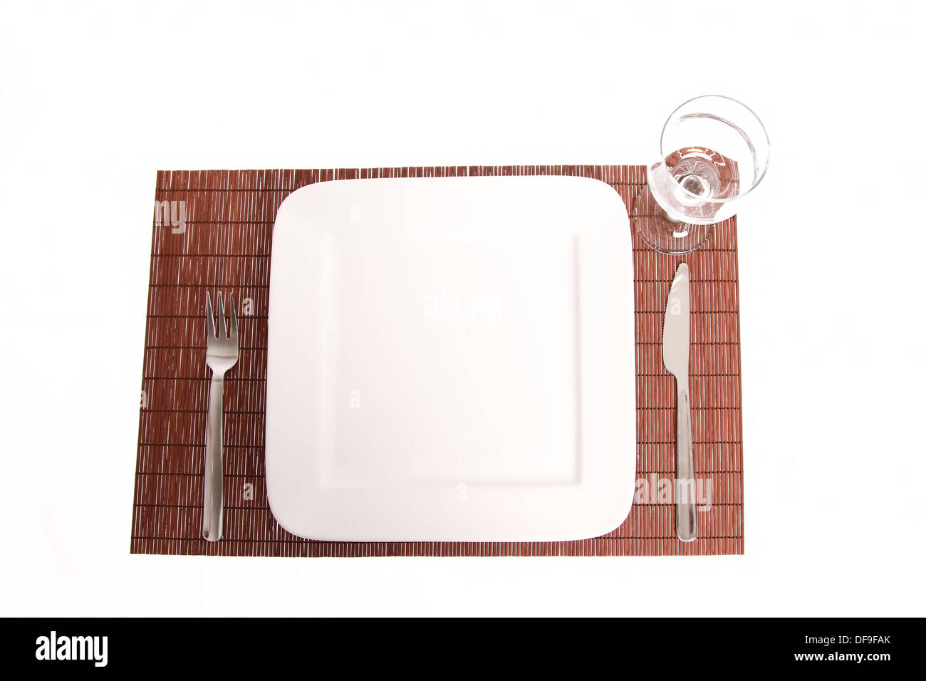 Simple Table set on a placemat Stock Photo - Alamy
