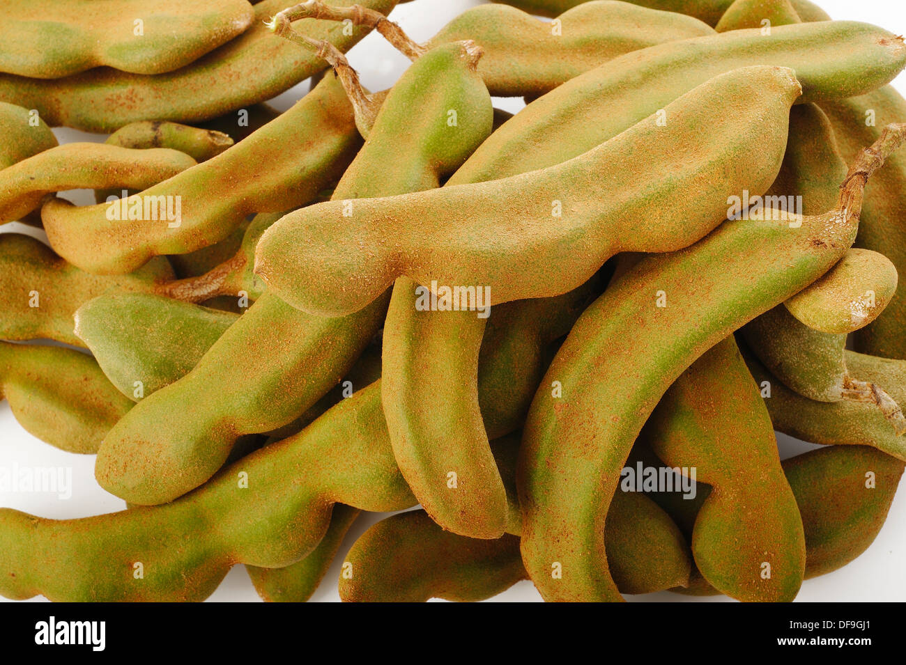 young tamarind on white background Stock Photo - Alamy