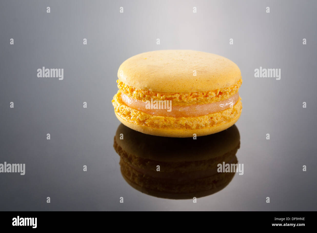 Lemon Macaron on gradient background Stock Photo - Alamy