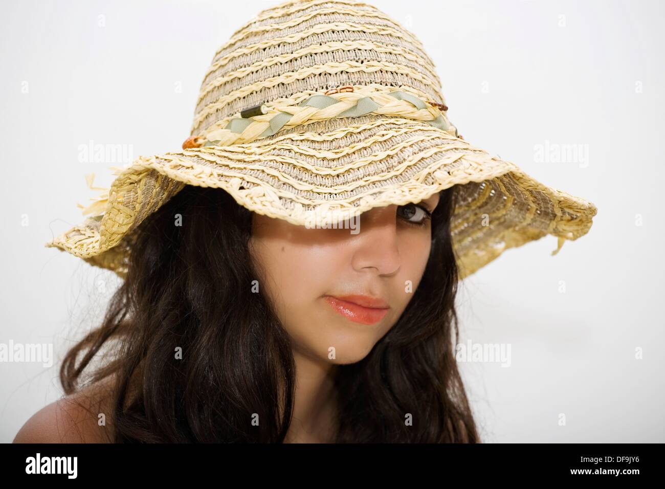 Pretty girl with picture hat Stock Photo - Alamy