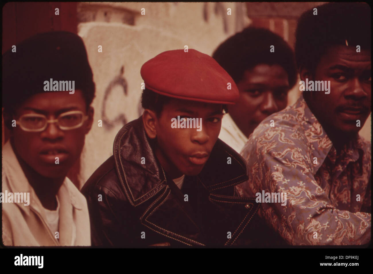 The image depicts members of a street gang. It provides a glimpse into ...