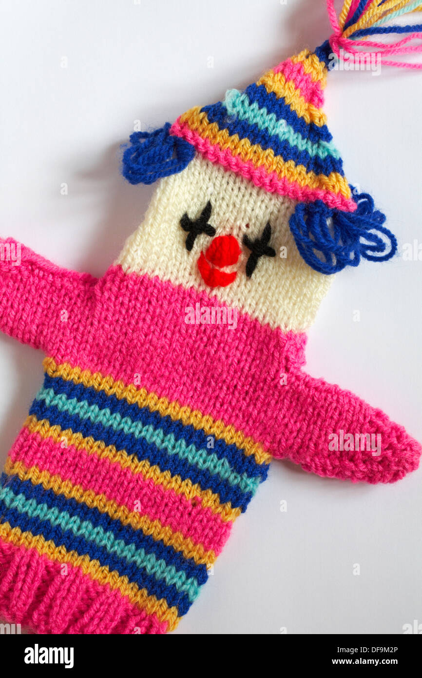hand knitted clown glove puppet on white background Stock Photo - Alamy