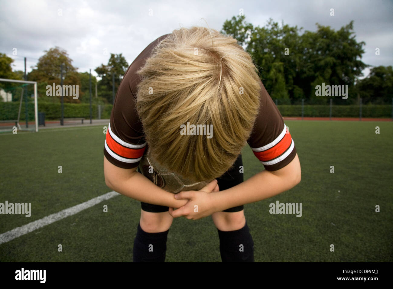 Child boy football head hold hi-res stock photography and images - Alamy