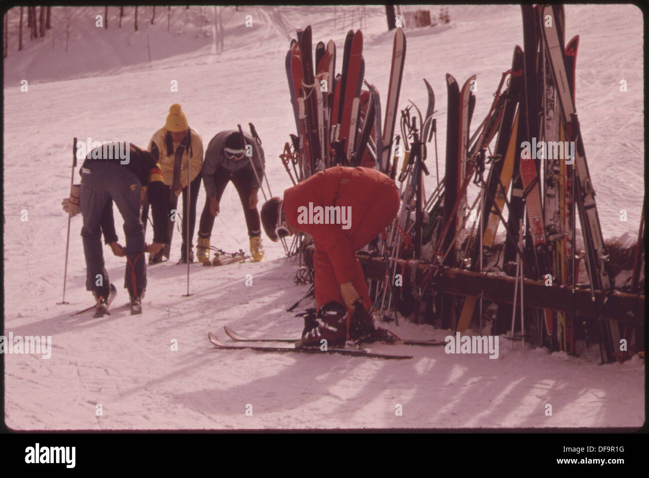 A skier is pictured wearing safety straps to ensure their skis remain ...