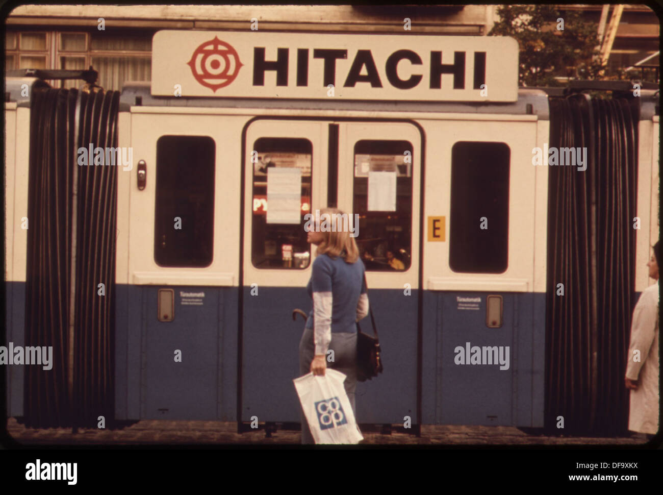 THIS SMALL 8-SEATER TROLLEY IS USED AS A HINGE SO THAT TWO LARGER ONES ...