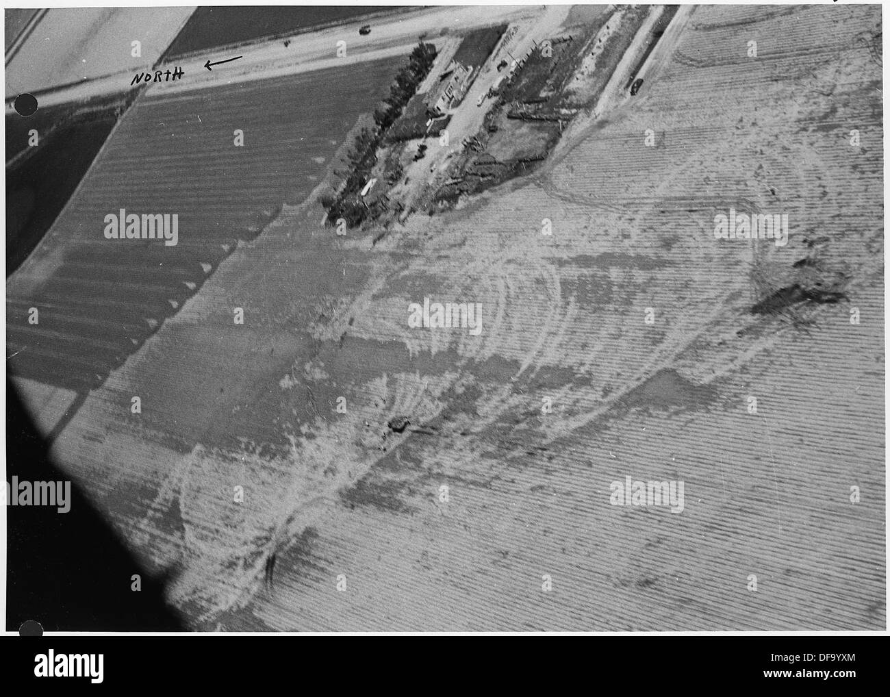 Photograph showing the marks left on the ground by a tornado in ...