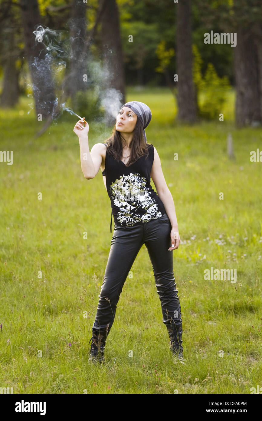 Woman Smoking Cigarette Forest High Resolution Stock Photography and ...