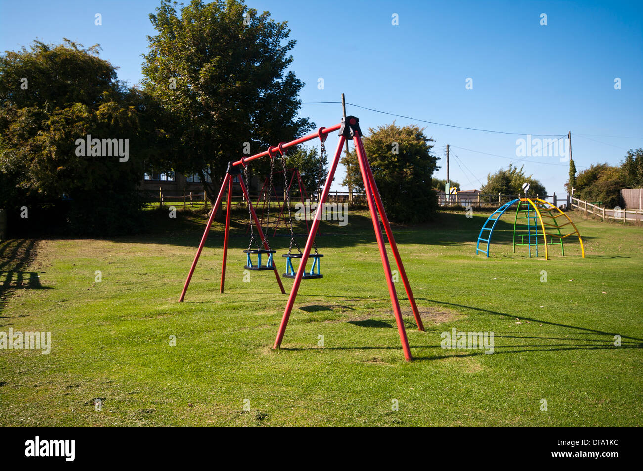 Swings playground hi-res stock photography and images - Alamy