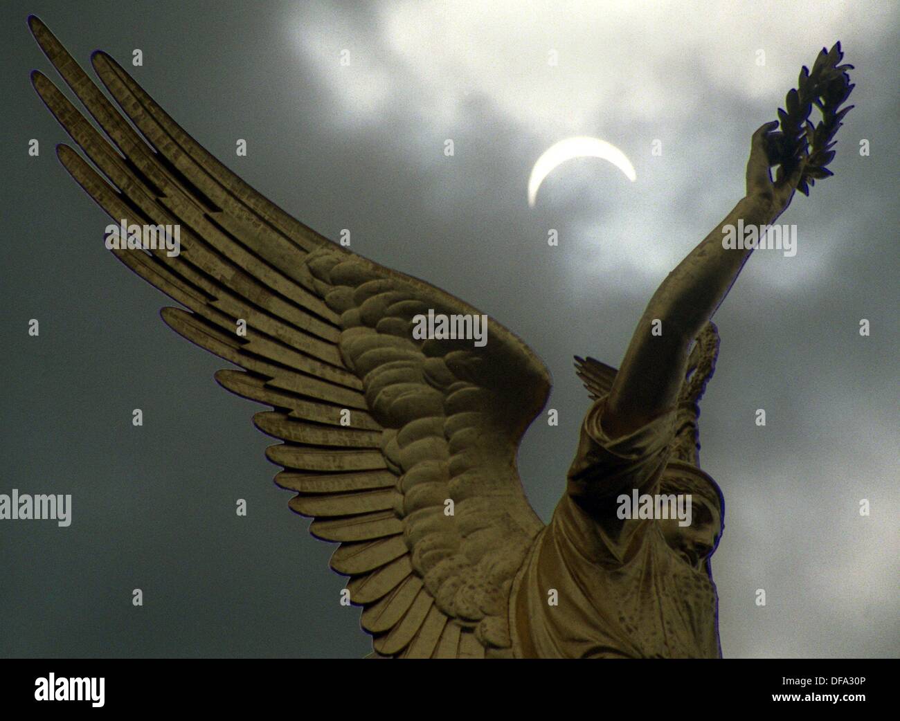 The solar eclipse behind the goddess of victory Viktoria on the victory ...