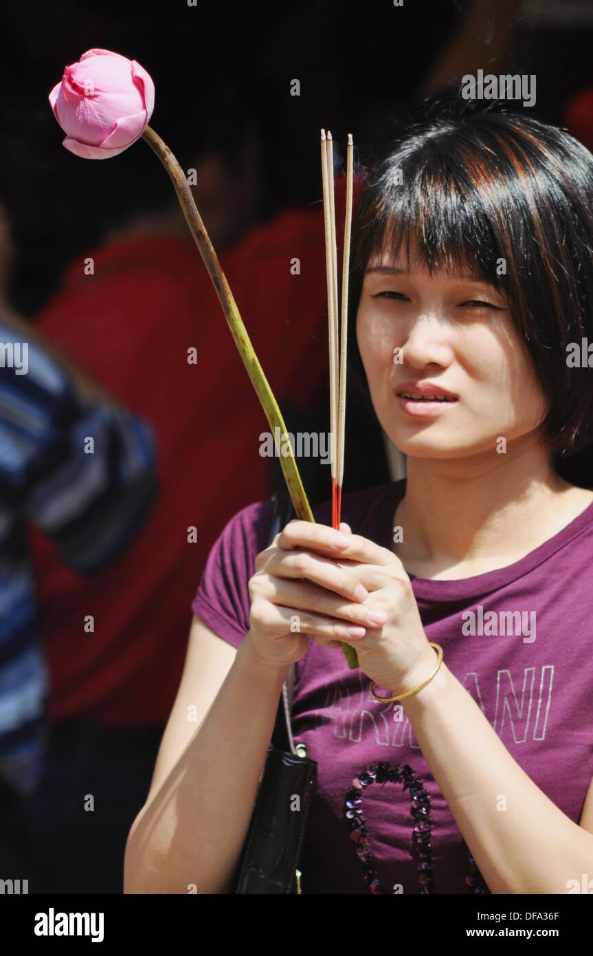 Chinese Woman Praying At Goddess Mercy High Resolution Stock ...