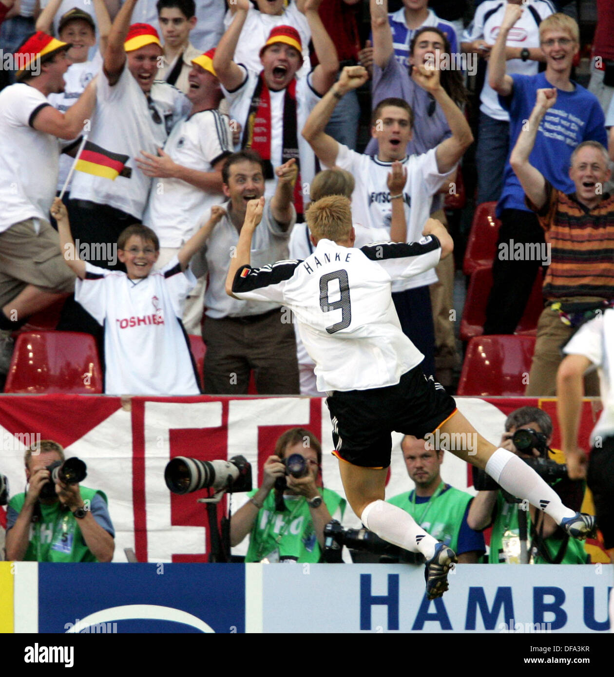 Sports spo soccer male gesture jumping germany hi-res stock photography ...