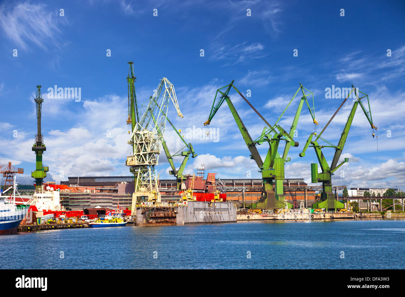 Big cranes and dock at the shipyard of Gdansk, Poland Stock Photo - Alamy