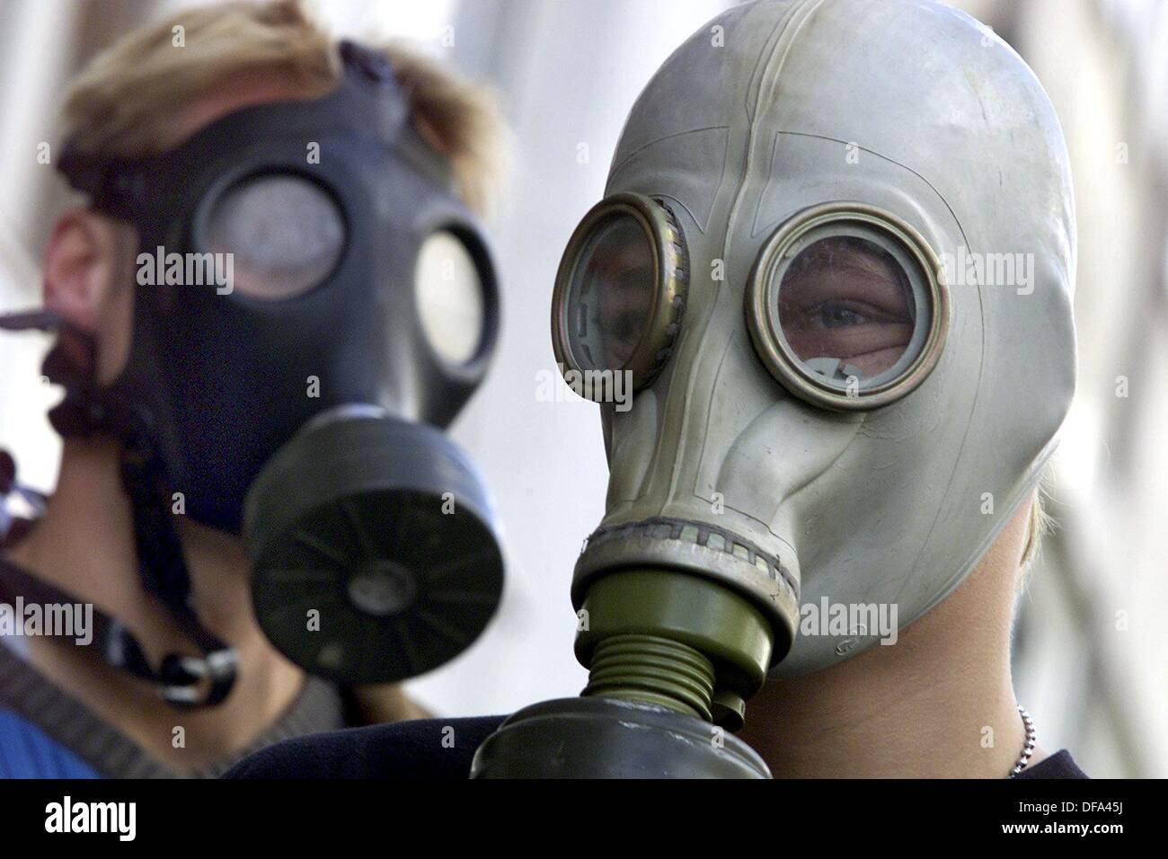Two men wear a Russian and an Israeli protective mask in Duesseldorf on ...