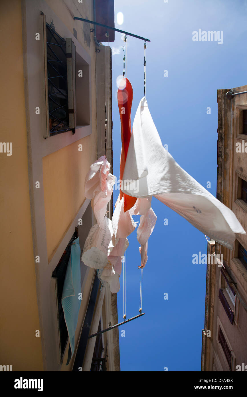 Laundry drying on windows hi-res stock photography and images - Alamy