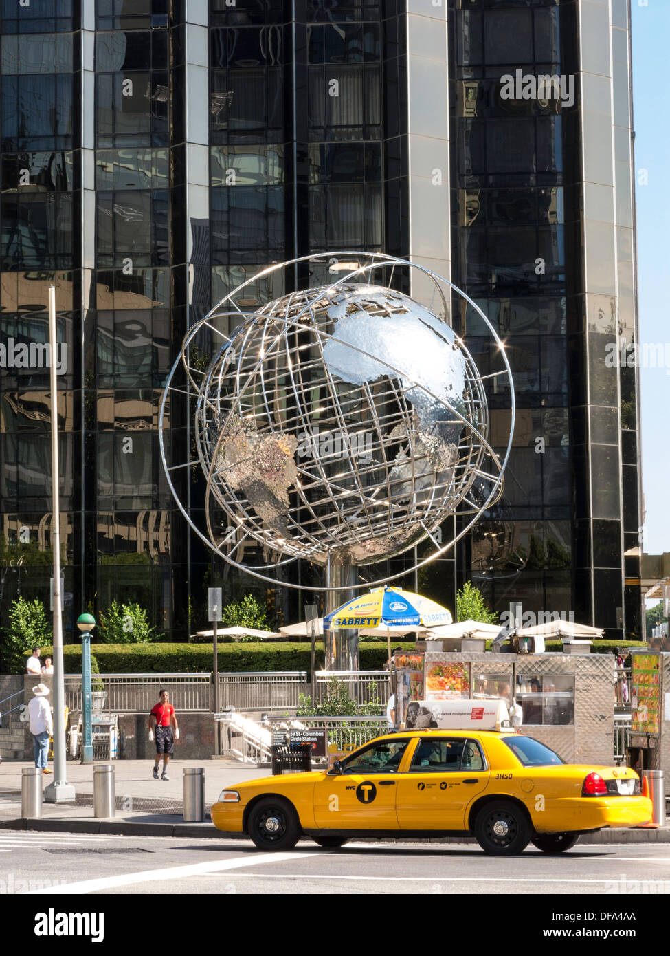 Columbus Circle with Globe and Taxi Stock Photo - Alamy