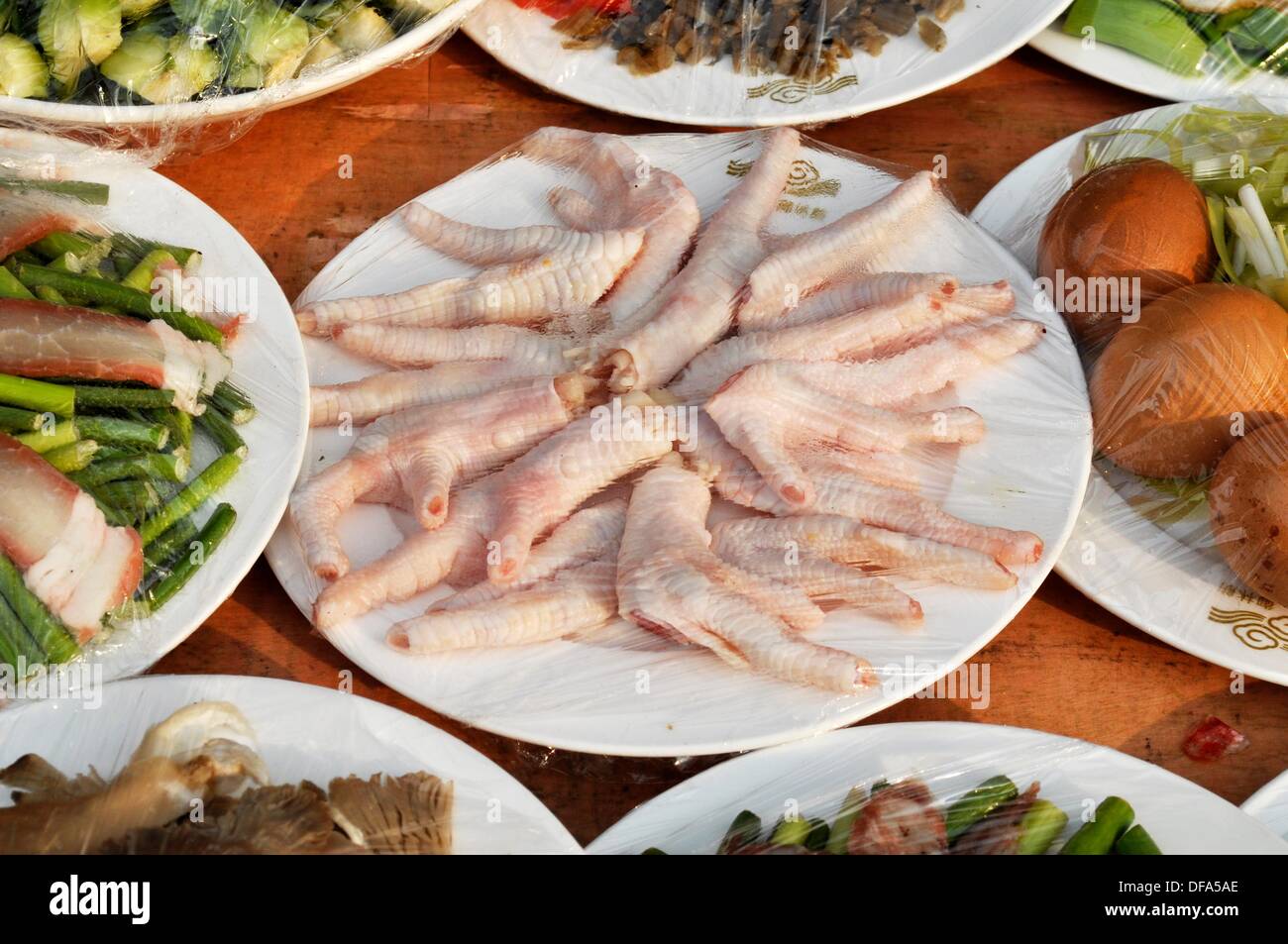 Shanghai (China): chicken legs sold in a street restaurant by the ...