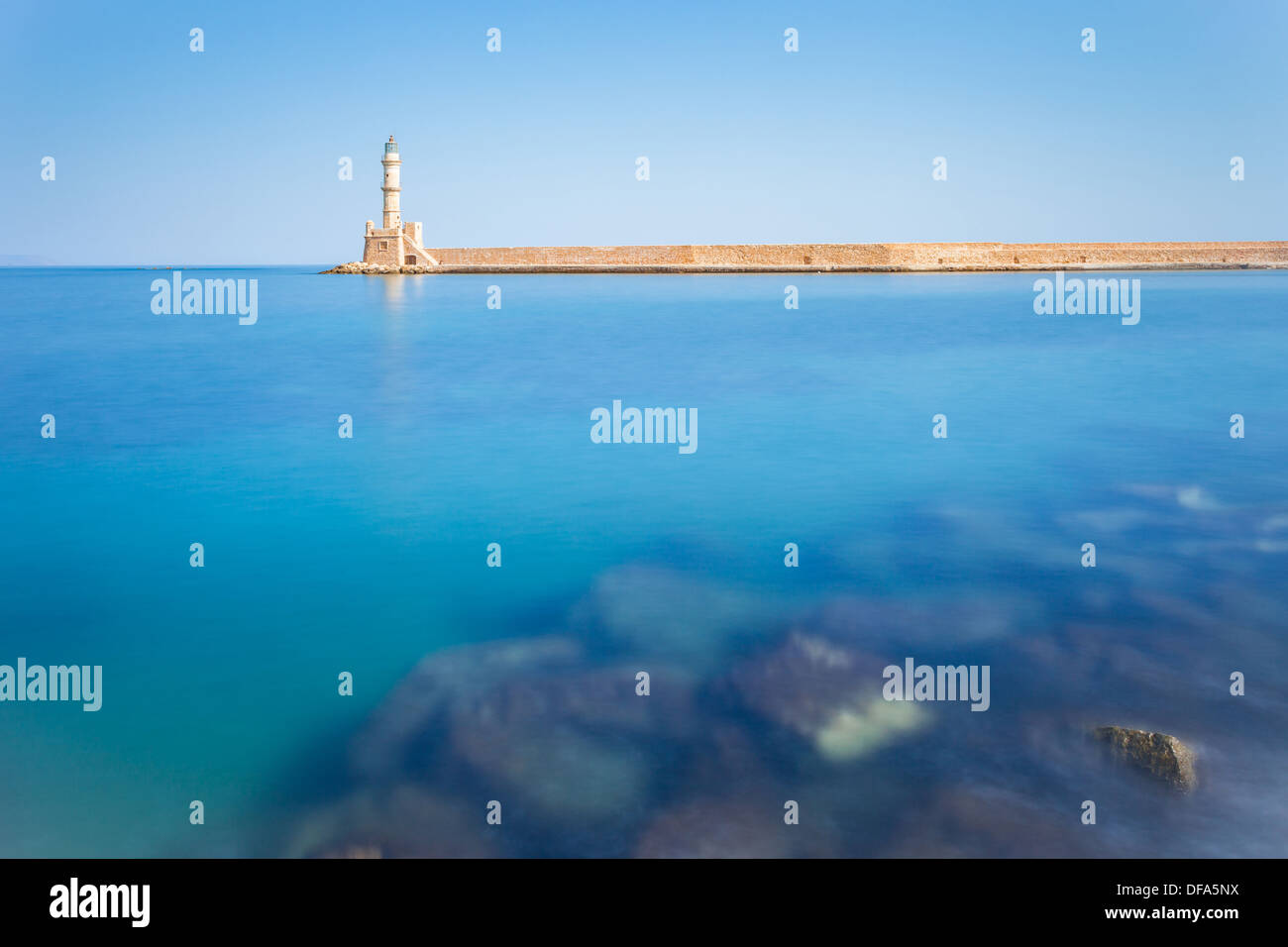 Chania, Greece: Ancient beacon in the old venetian harbor of Chania in ...