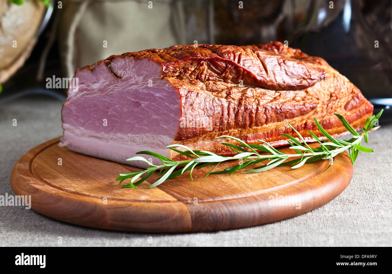 smoked meat and rosemary on a linen cloth Stock Photo - Alamy