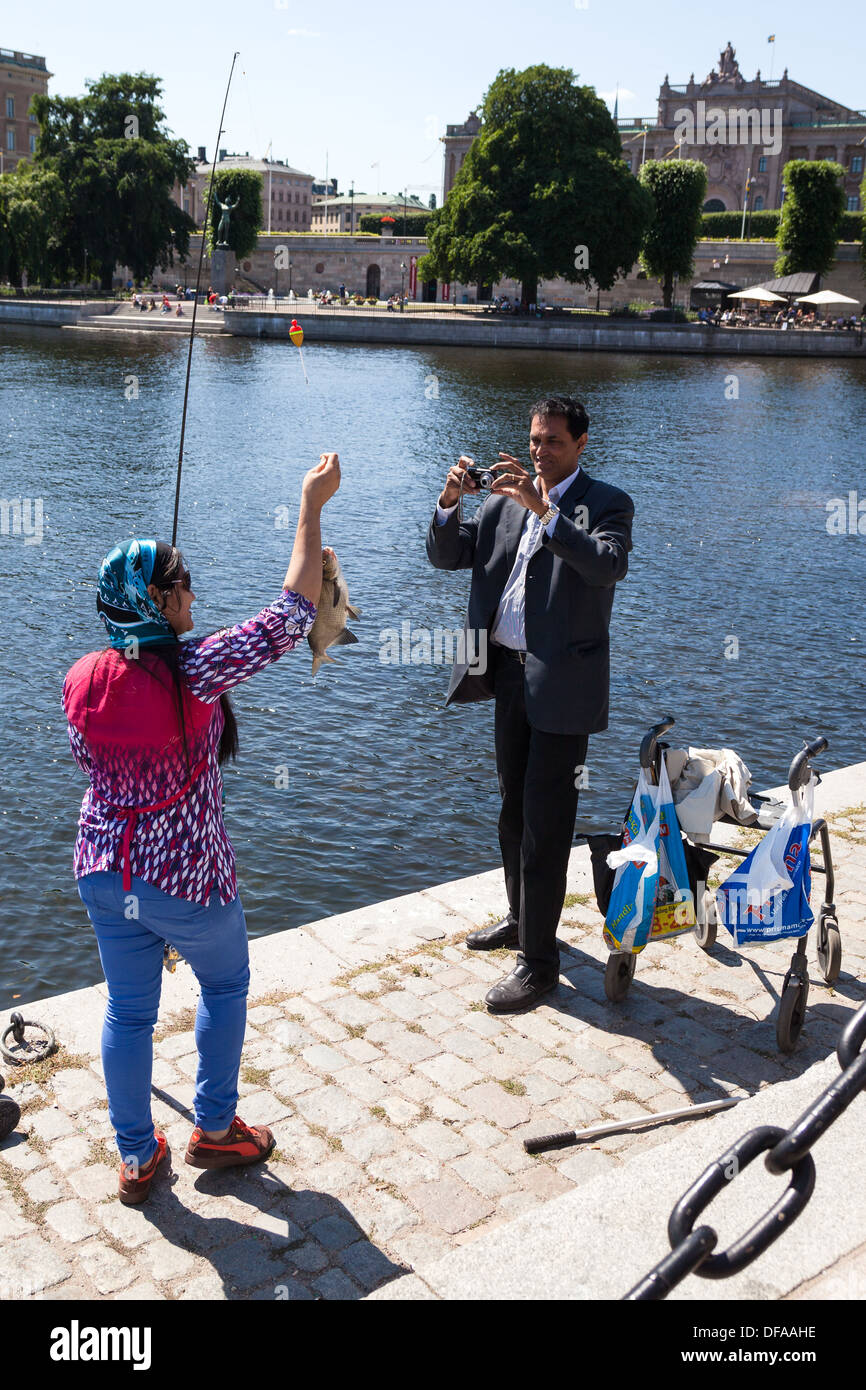 Man catching woman hi-res stock photography and images - Alamy