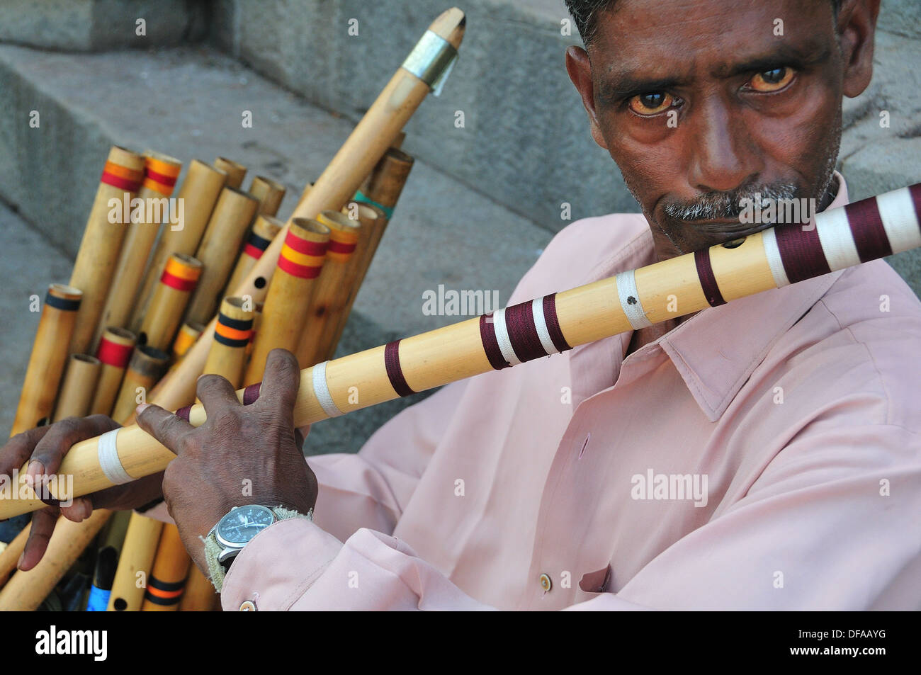 Indian man with flute hi-res stock photography and images - Alamy