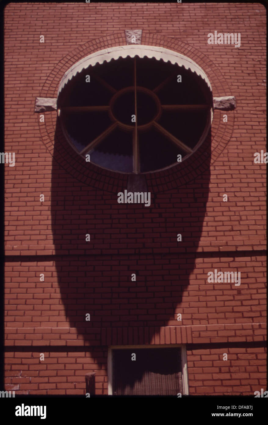 This image showcases the stained glass window of a Methodist church in ...