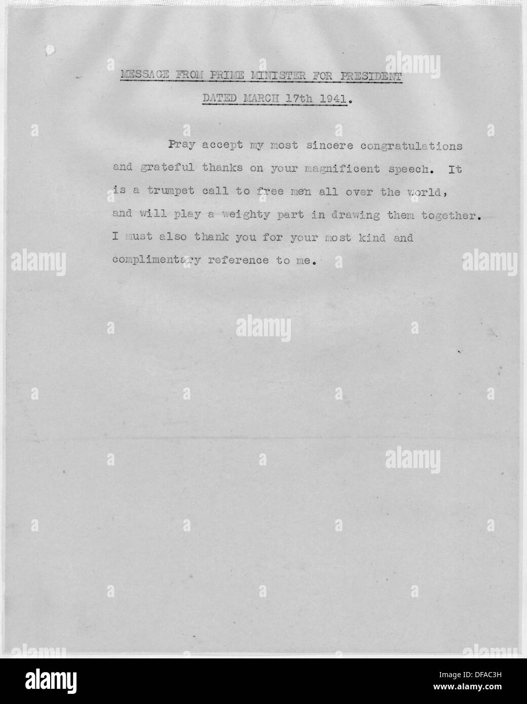 This photograph shows Winston Churchill writing a letter to Franklin D ...