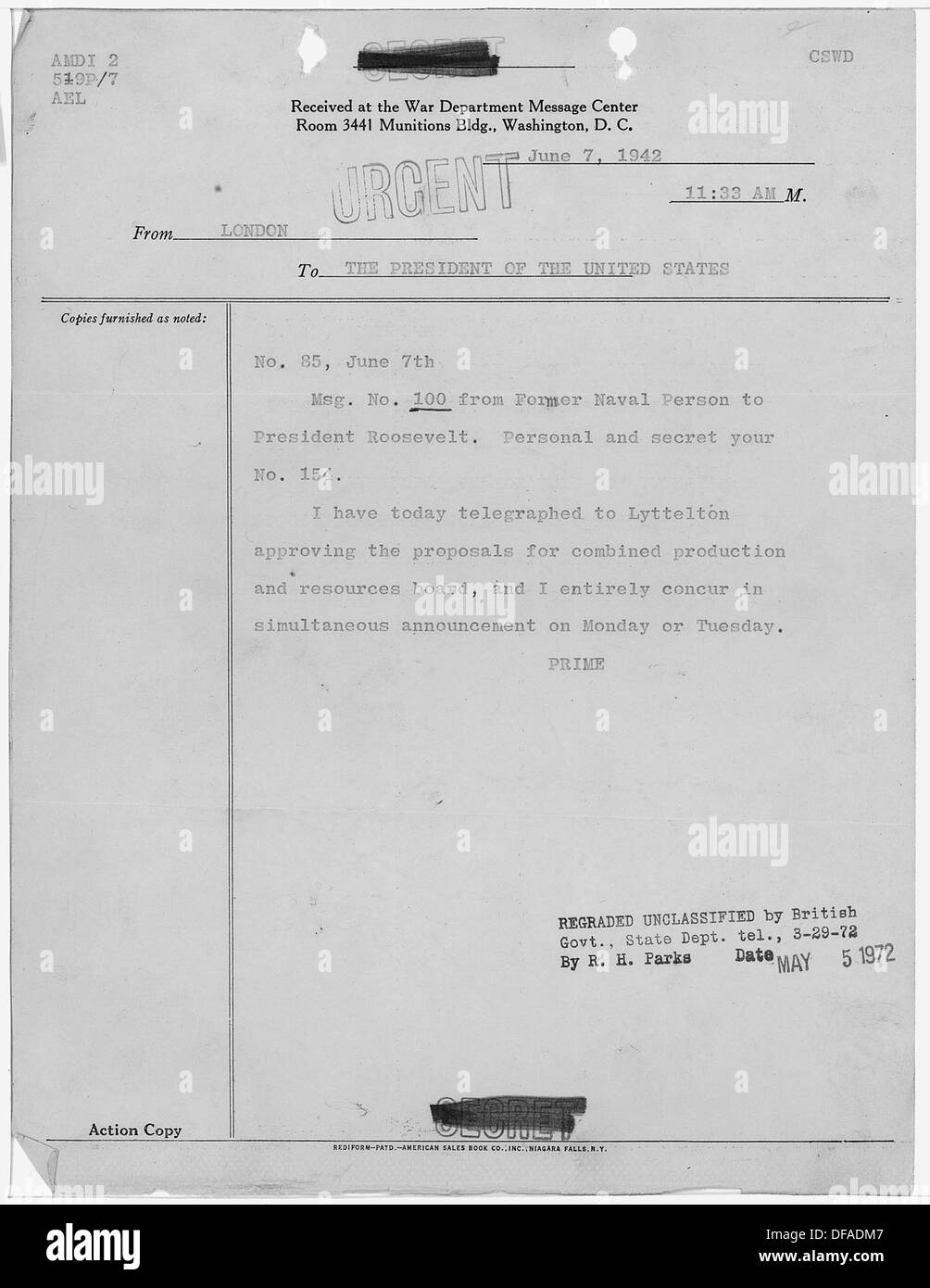 A photograph capturing Winston Churchill writing a letter to Franklin D ...