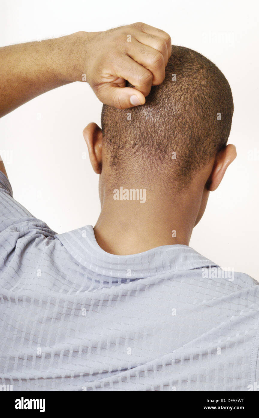 Man back view scratching head hi-res stock photography and images - Alamy