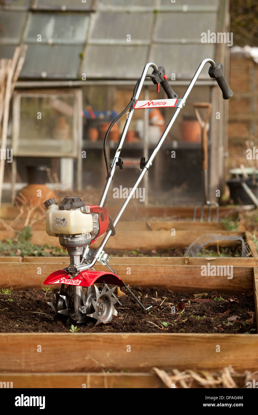 Rotavator on a garden plot UK Stock Photo - Alamy