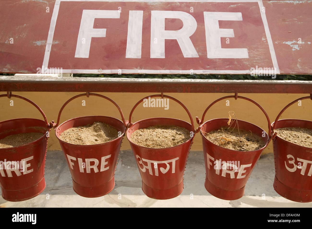 Fire fighting buckets in India Stock Photo - Alamy